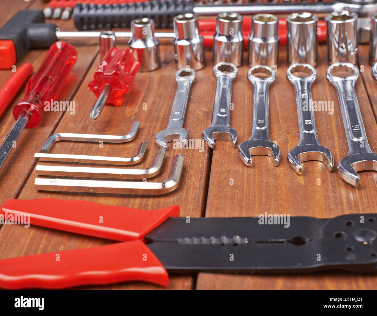 Set of different work tools on wooden surface Stock Photo - Alamy
