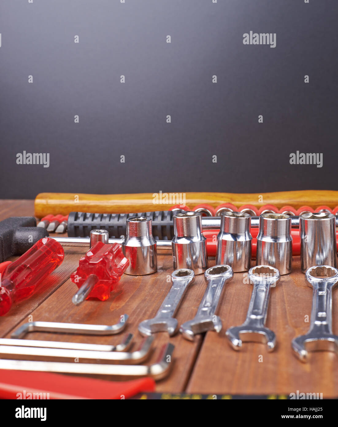 Set of different work tools on wooden surface Stock Photo - Alamy