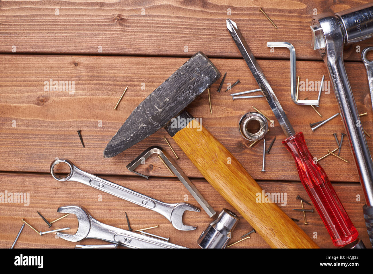 Set of different work tools on wooden surface Stock Photo - Alamy