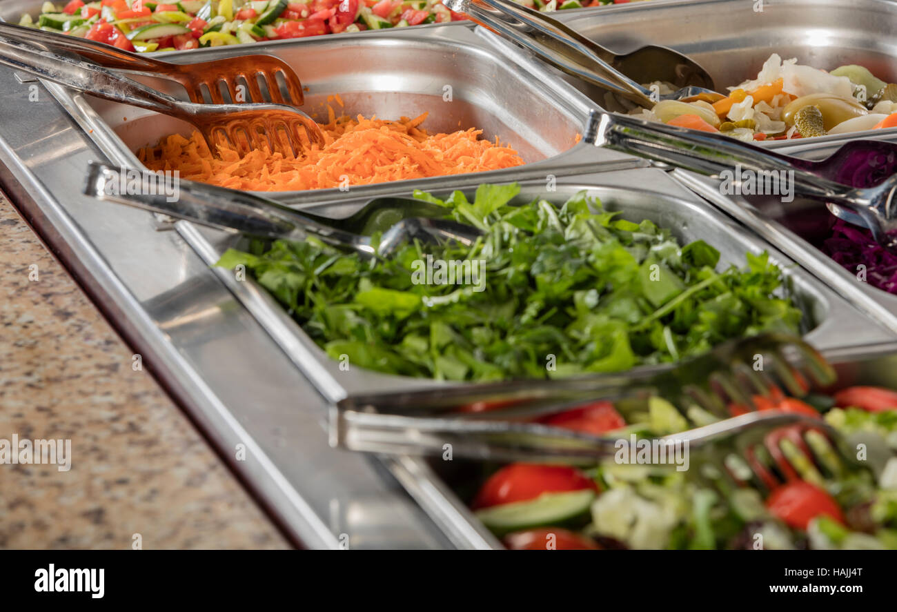 chef standing behind full lunch service station Stock Photo - Alamy