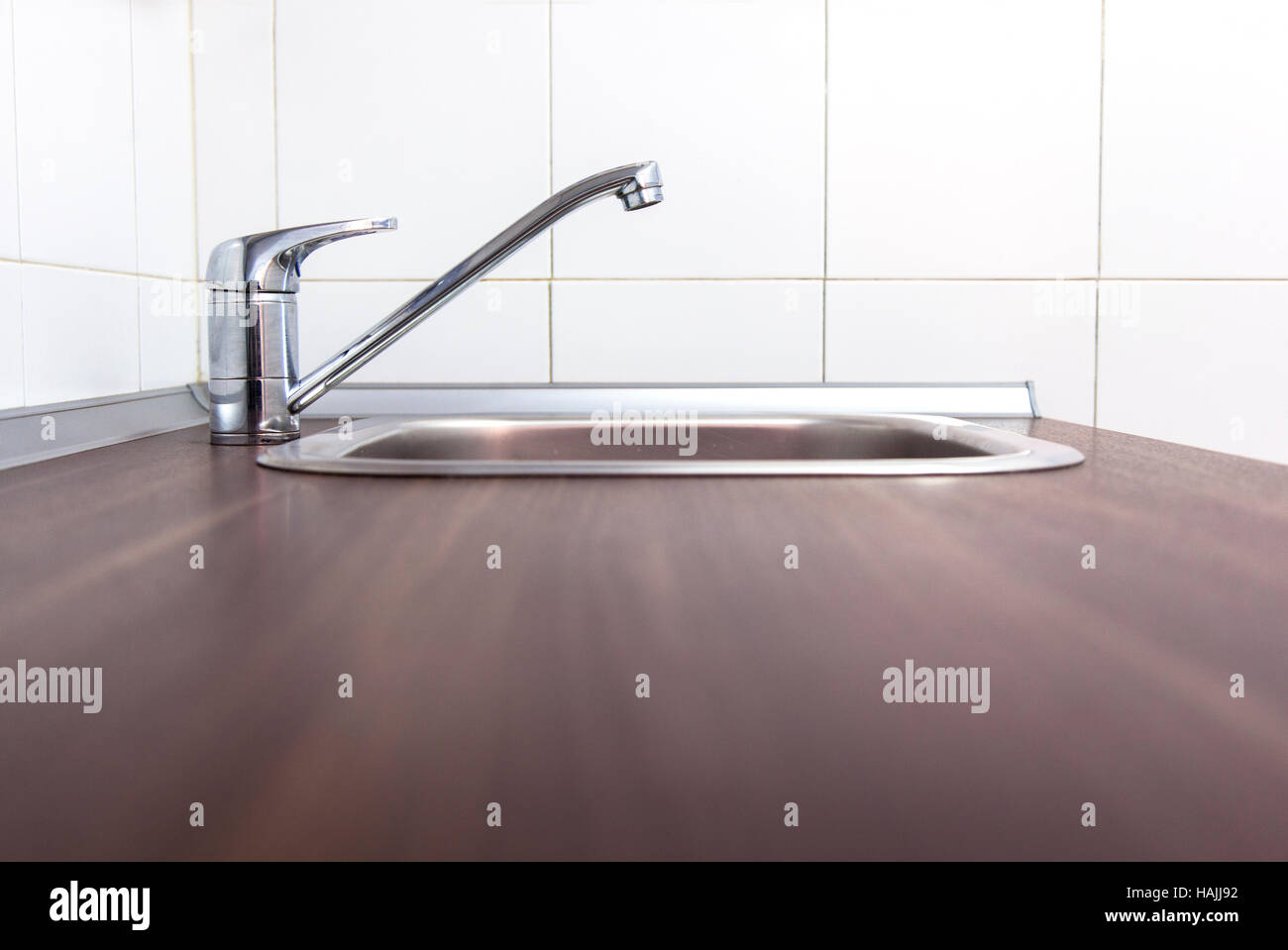 Close up view of stainless steel kitchen faucet and sink Stock Photo ...