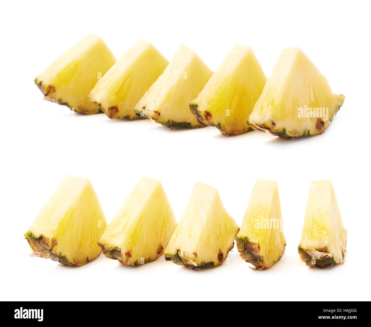 Slices of pineapple isolated over white background Stock Photo - Alamy