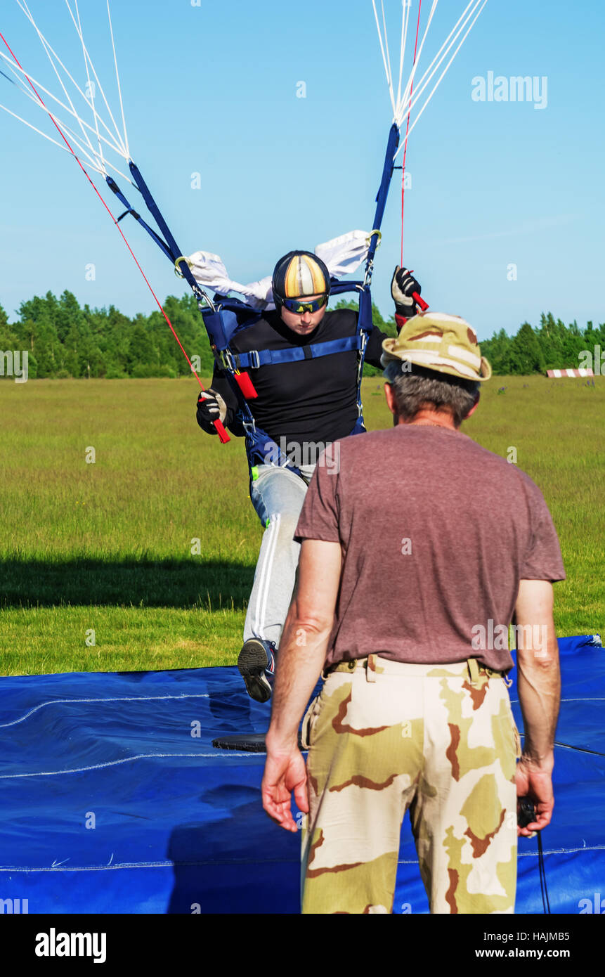 Parachutists - 2015.Landing on airfield Stock Photo - Alamy