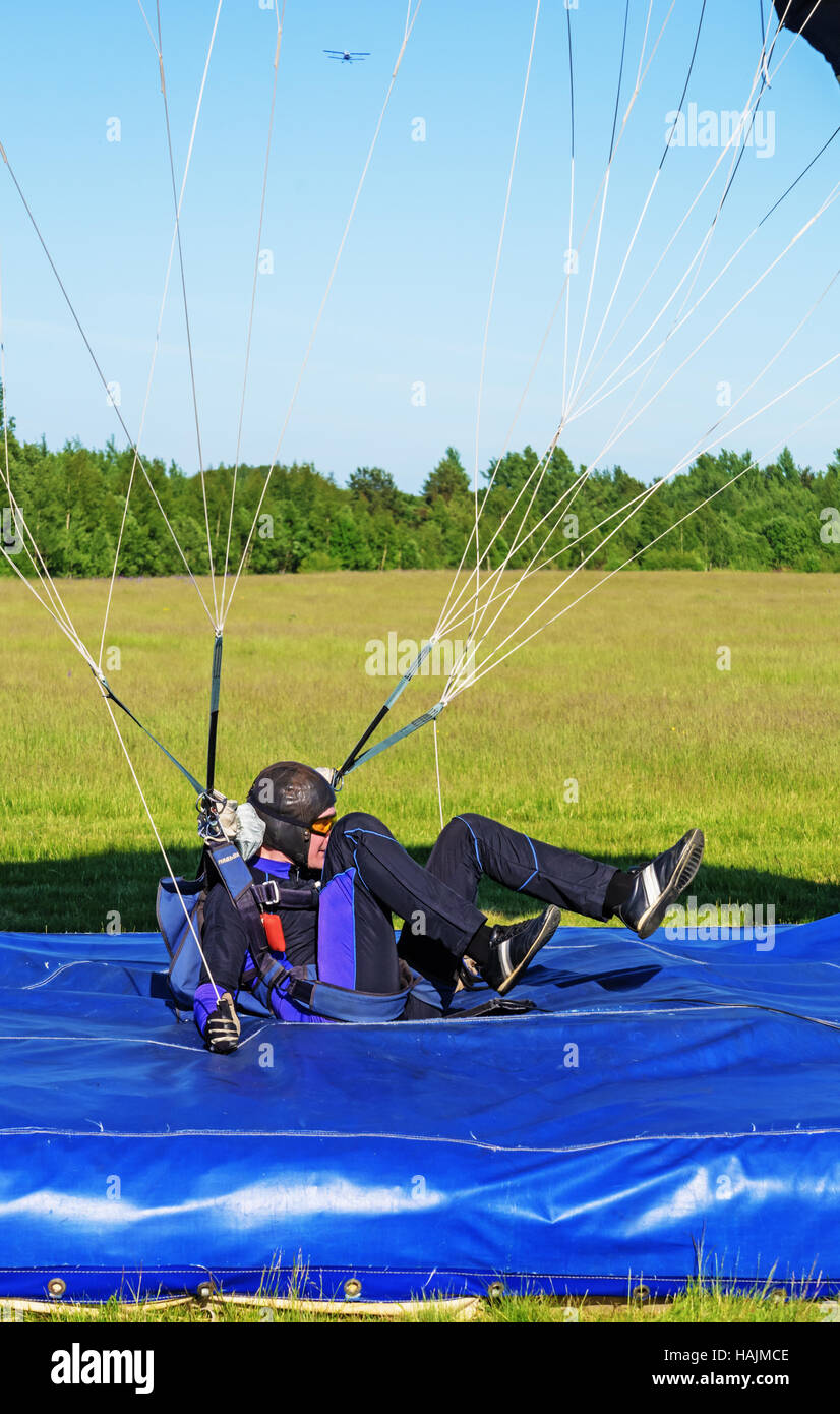 Parachutists - 2015.Landing on airfield Stock Photo - Alamy
