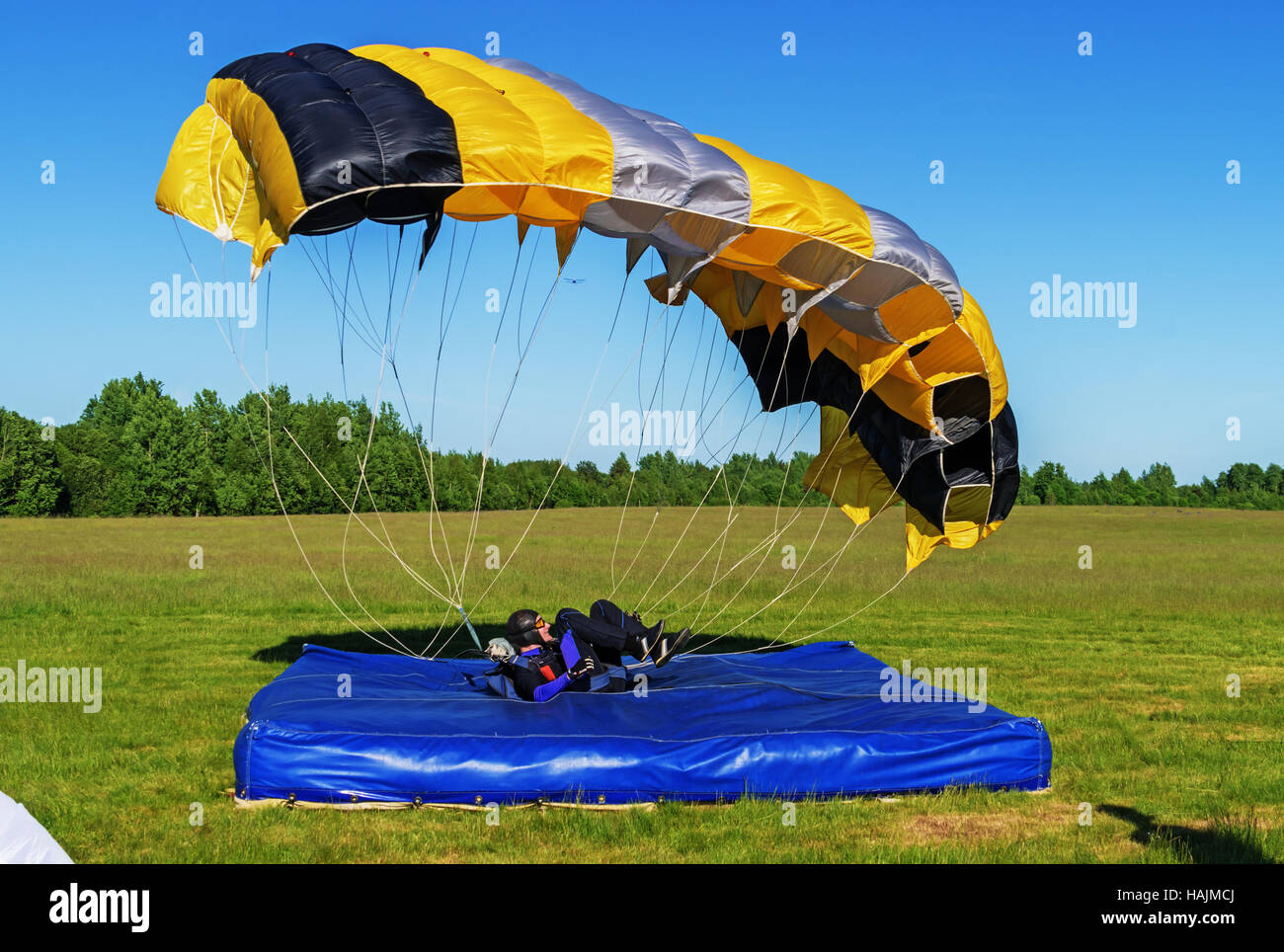 Parachutists - 2015.Landing on airfield Stock Photo - Alamy