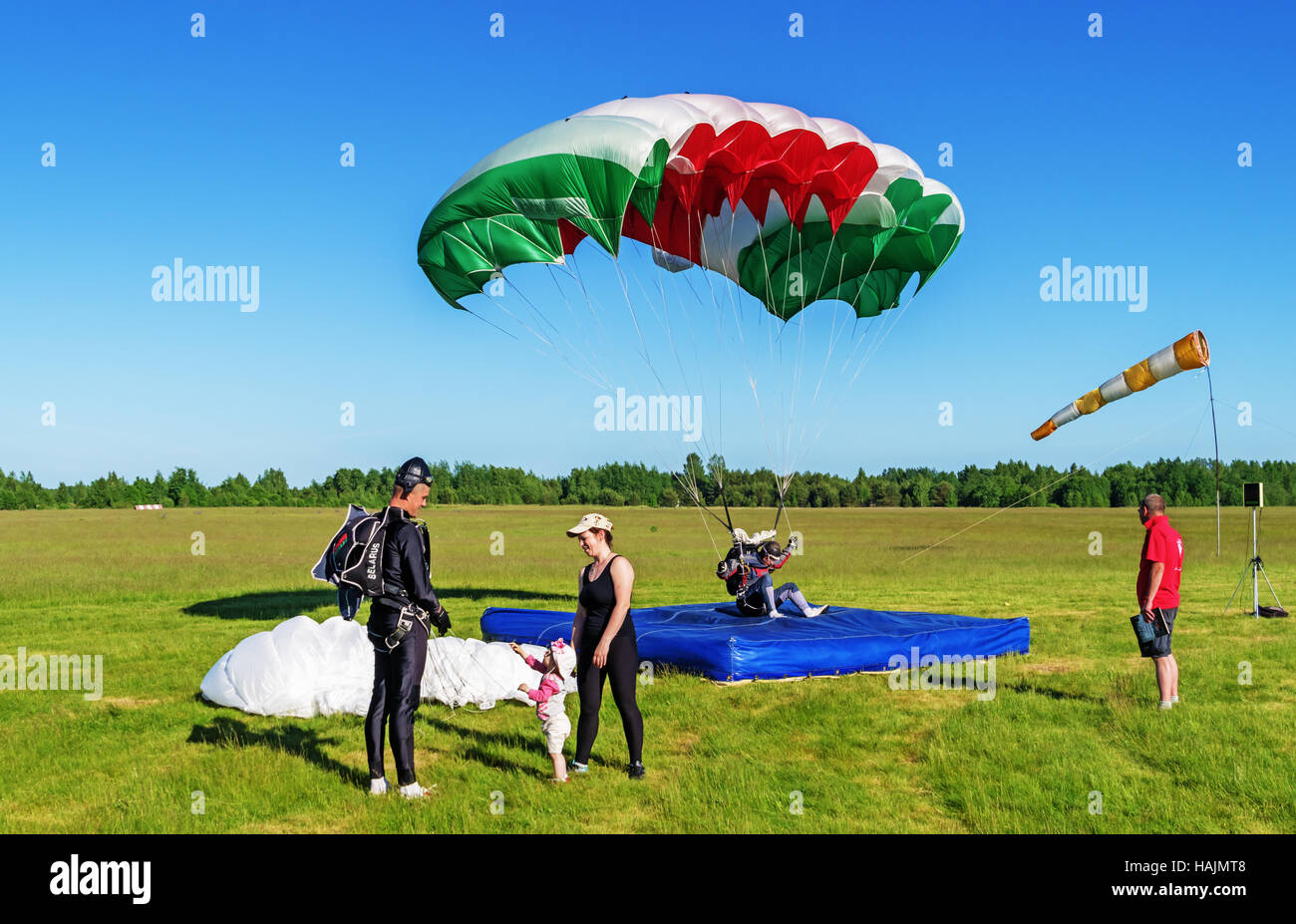 Parachutists - 2015.Landing on airfield Stock Photo - Alamy