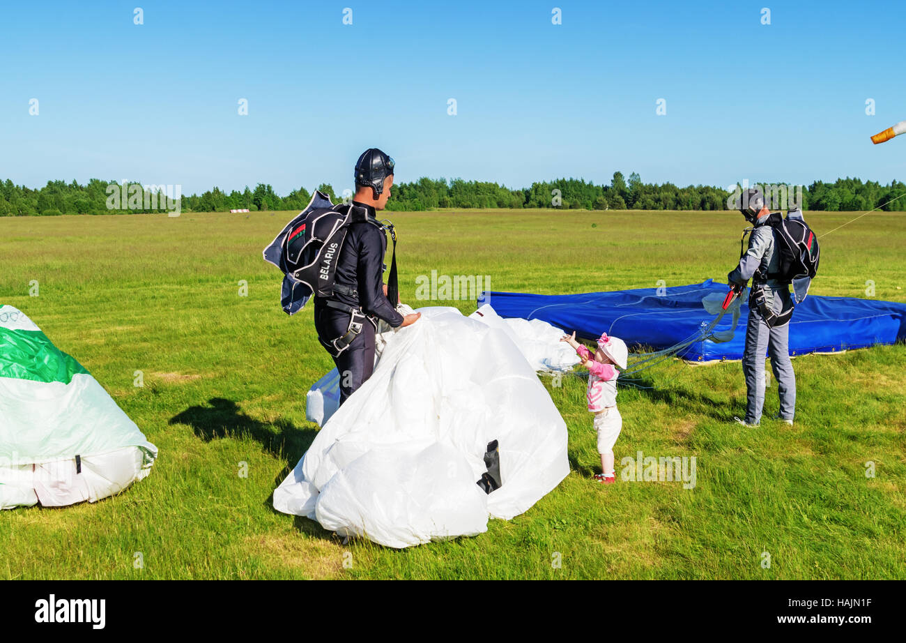 Parachutists - 2015.After landing.Skydiver and their child Stock Photo ...