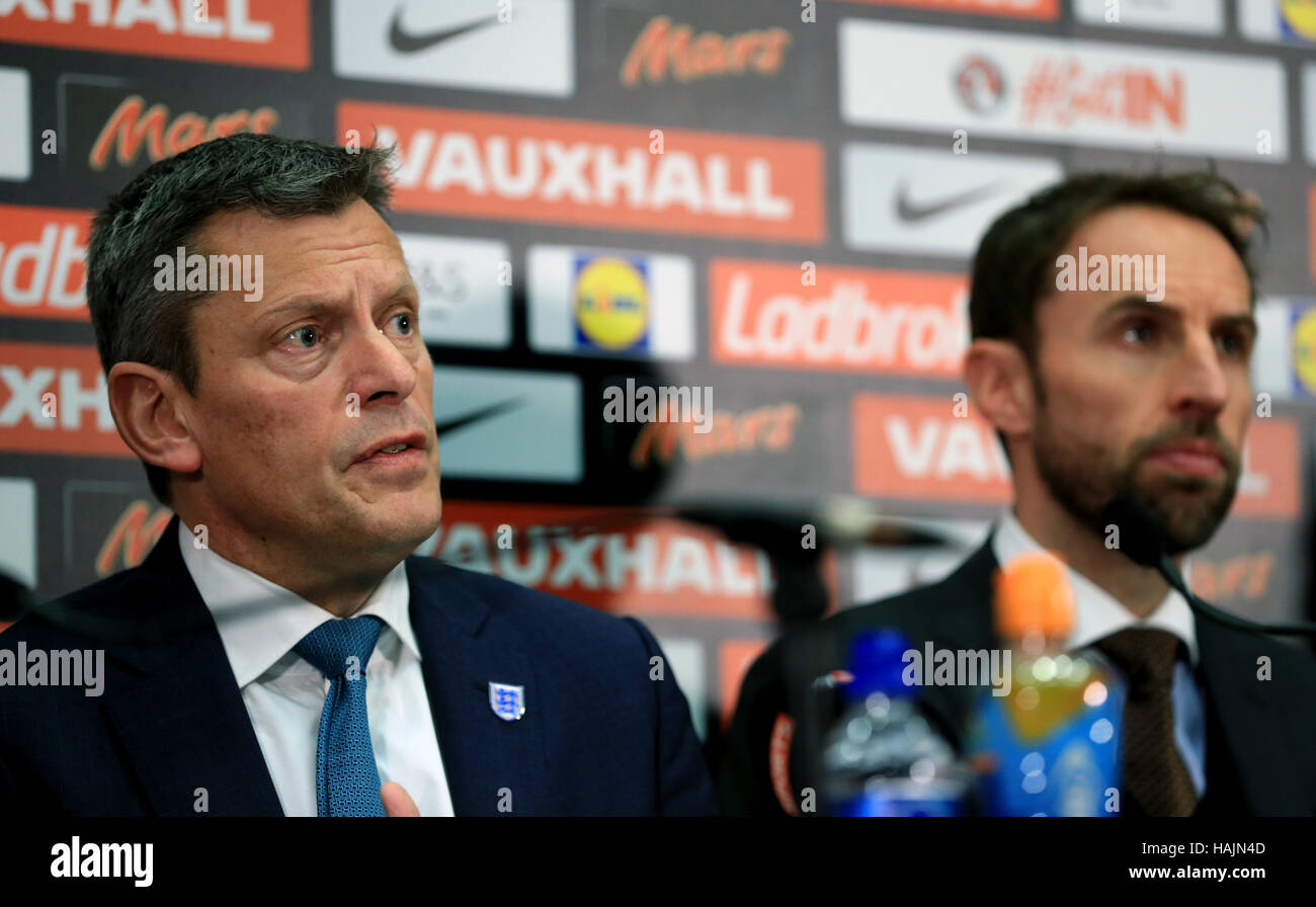 New England manager Gareth Southgate (right) with Chief Executive ...