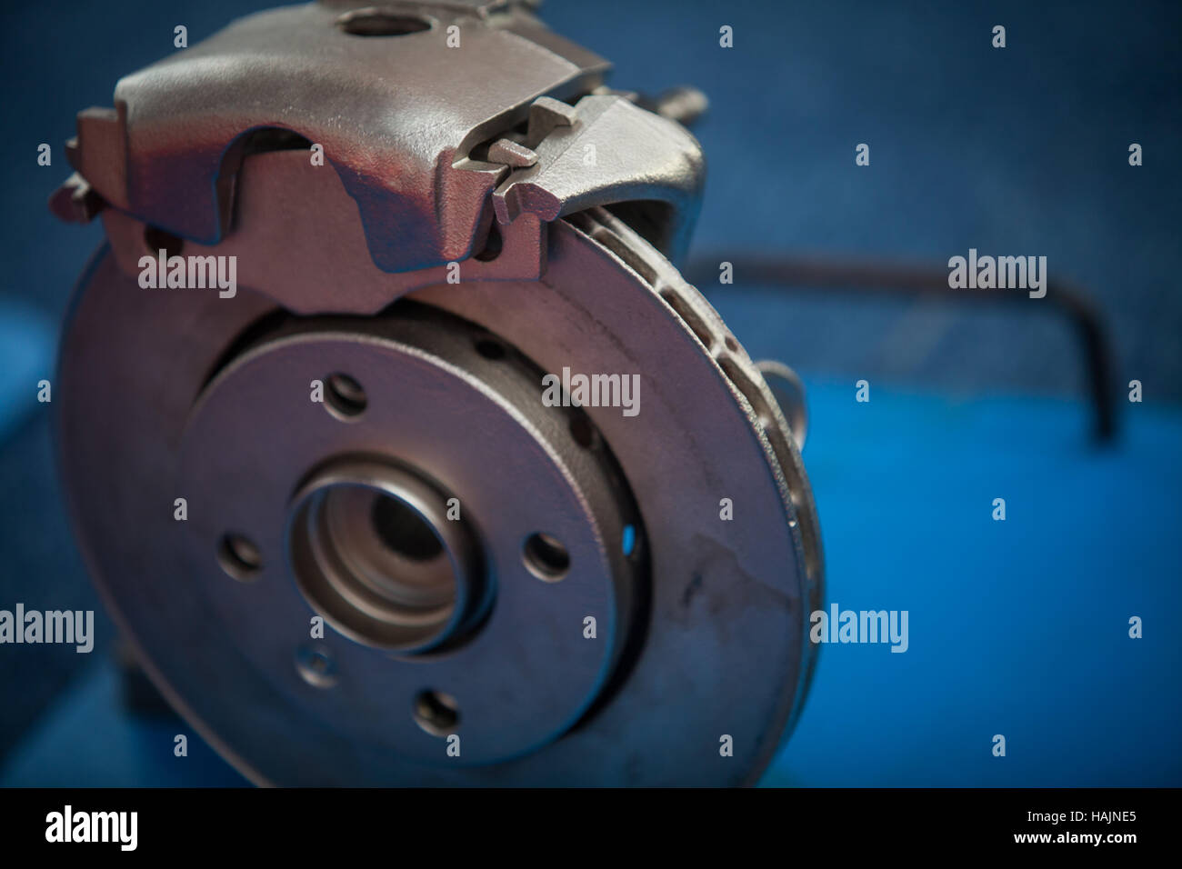 Close up image of a car's brake disk and caliper Stock Photo - Alamy