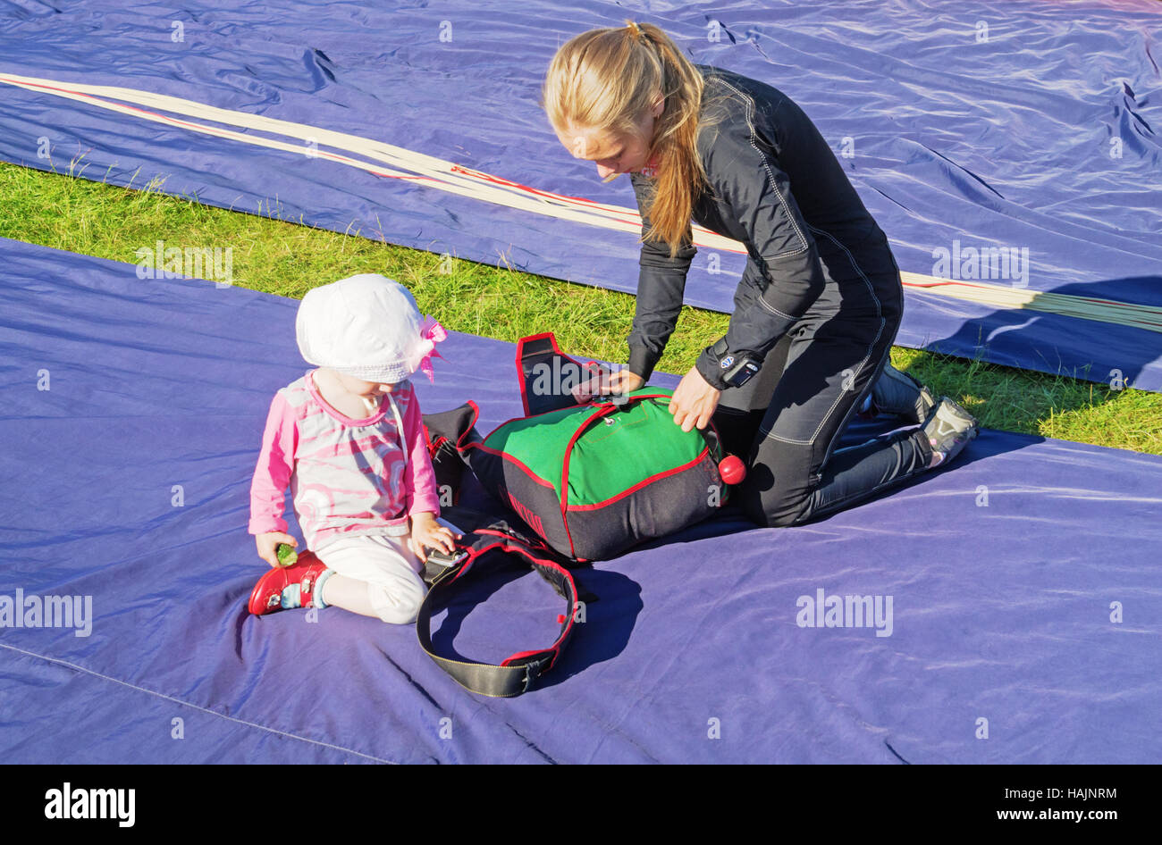 Parachutists - 2015.Skydiver and child Stock Photo - Alamy