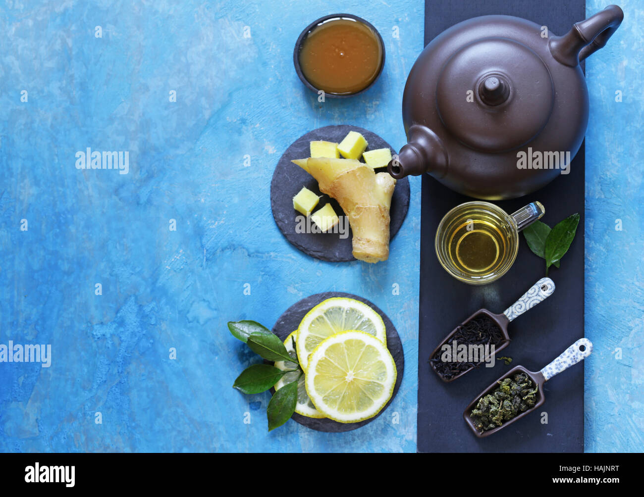 Tea set with ginger, lemon and honey Stock Photo - Alamy