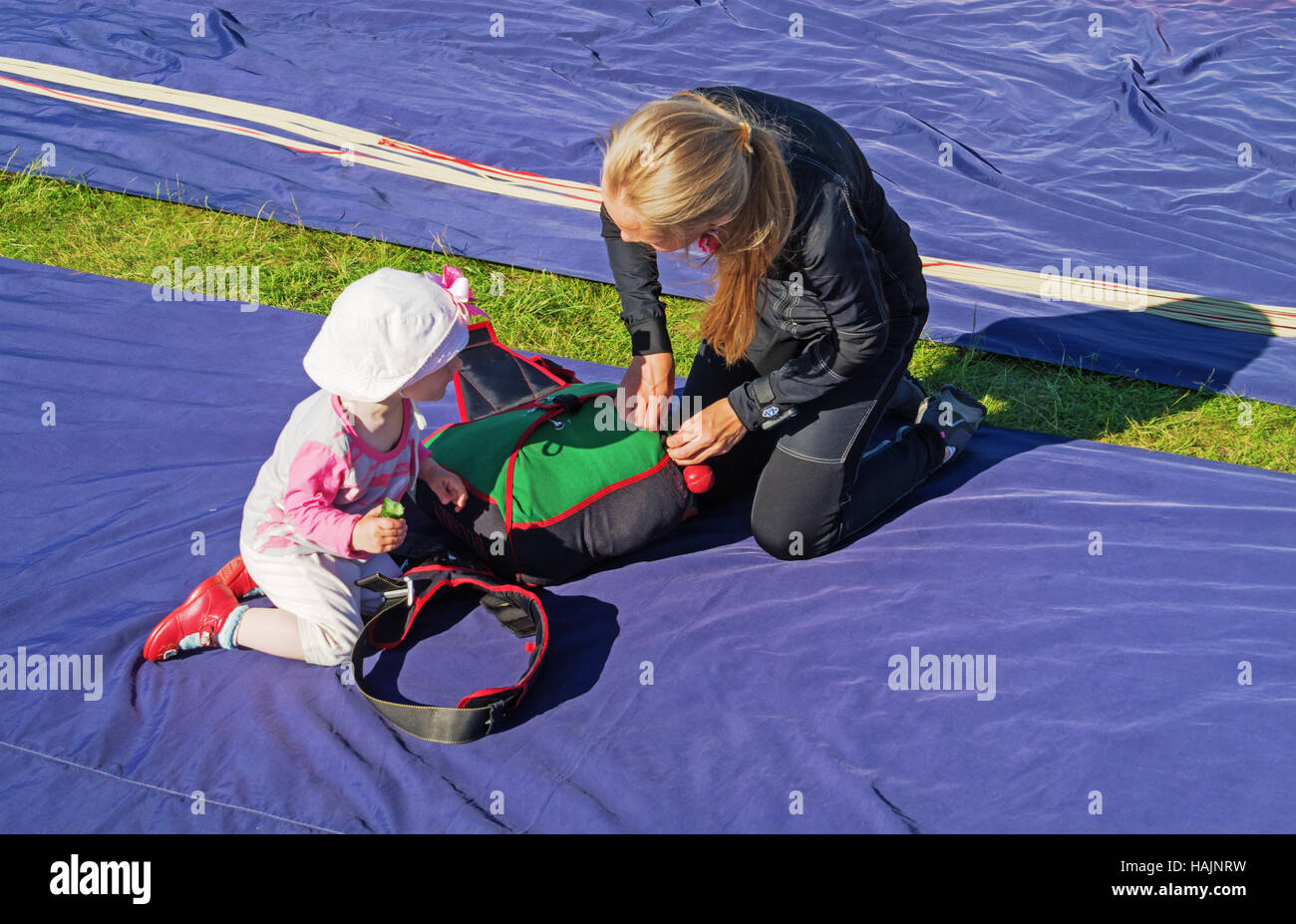 Parachutists - 2015.Skydiver and child Stock Photo - Alamy
