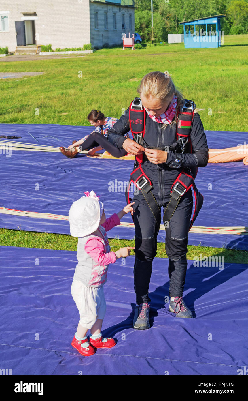 Parachutists - 2015.Skydiver and child Stock Photo - Alamy