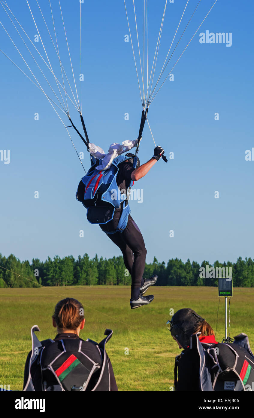 Parachutists - 2015.The skydiver landing under parachute Stock Photo ...