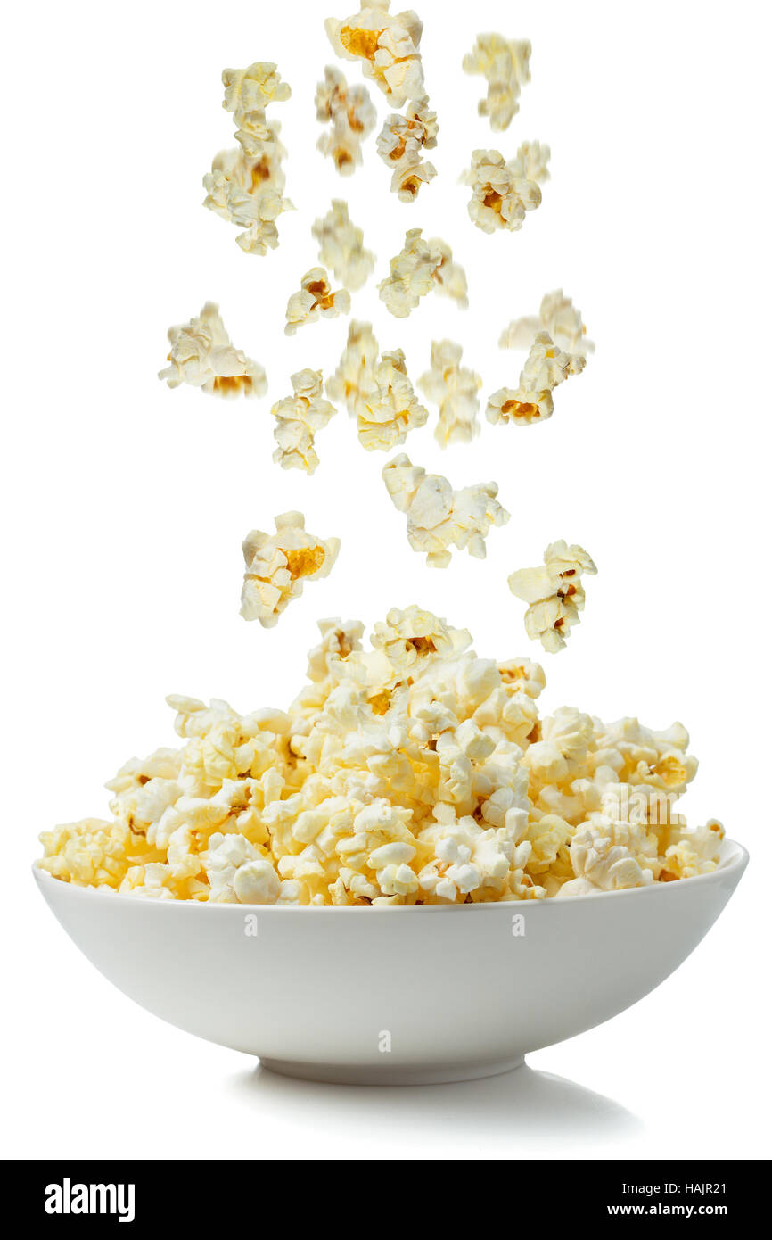 Popcorn falling in a bowl Stock Photo - Alamy