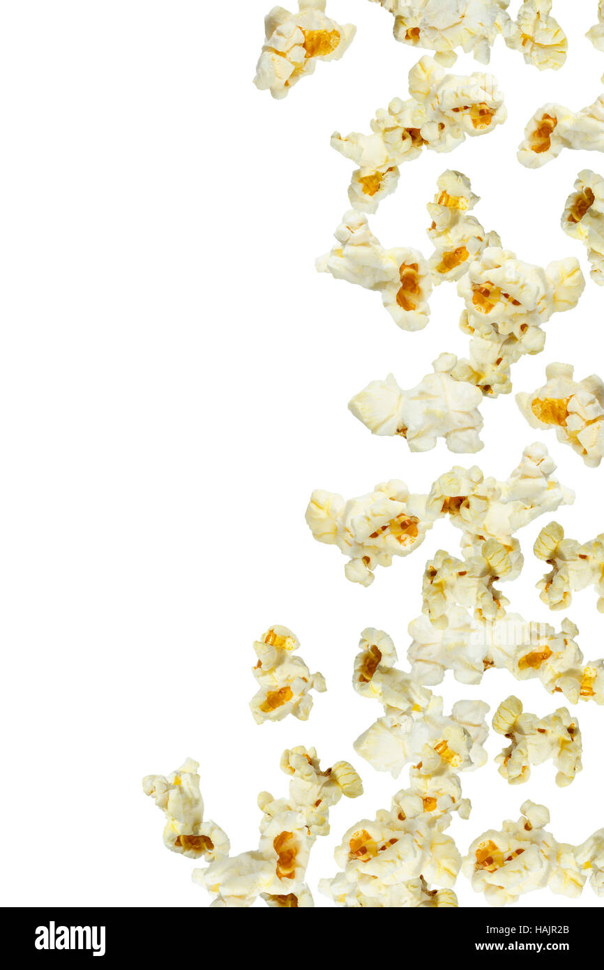 Fresh popcorn falling, close up Stock Photo - Alamy