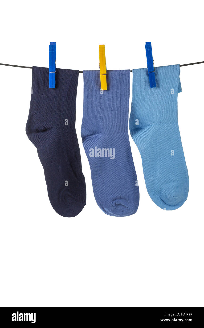 Socks hanging on washing line hi-res stock photography and images - Alamy