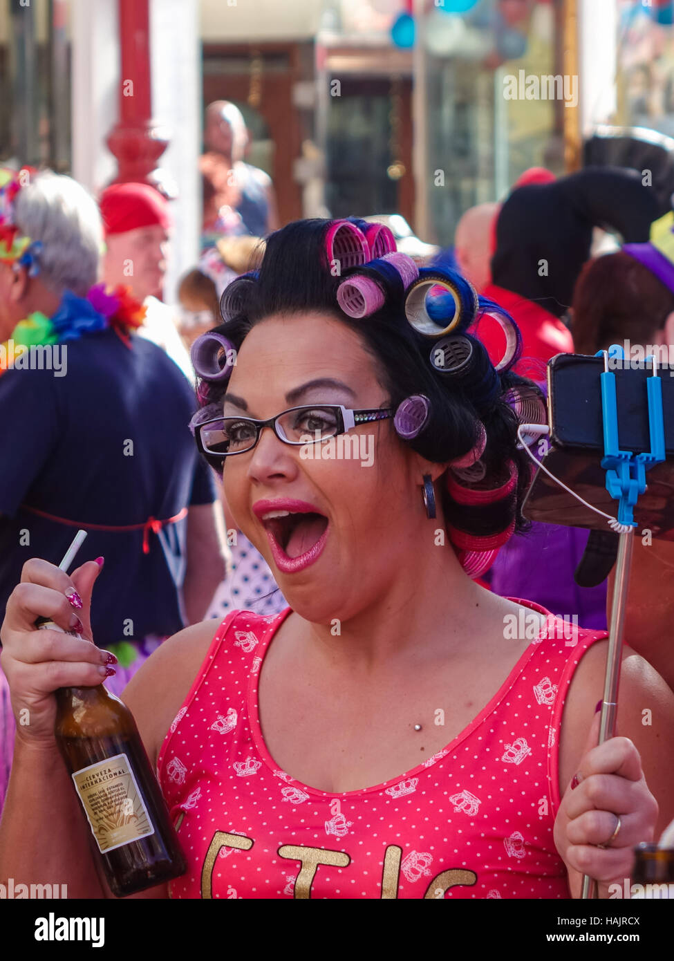 British fancy dress street party in Benidorm, Spain. Young woman ...