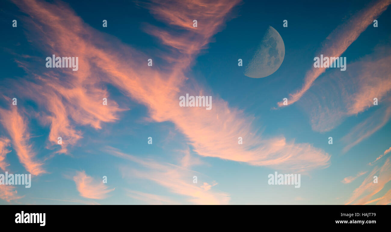 Sunset sky with half moon Stock Photo - Alamy