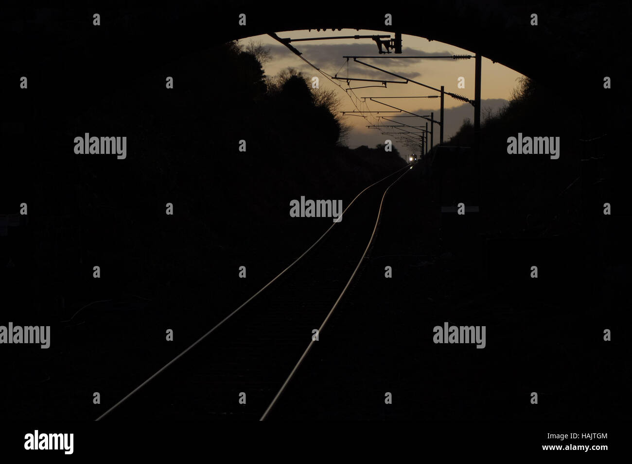 Train with light coming down railway line from Edinburgh at North ...