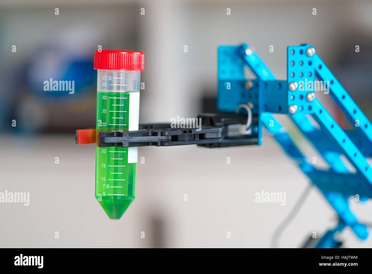 The robot arm tracks on doing an experiment with dangerous chemicals ...