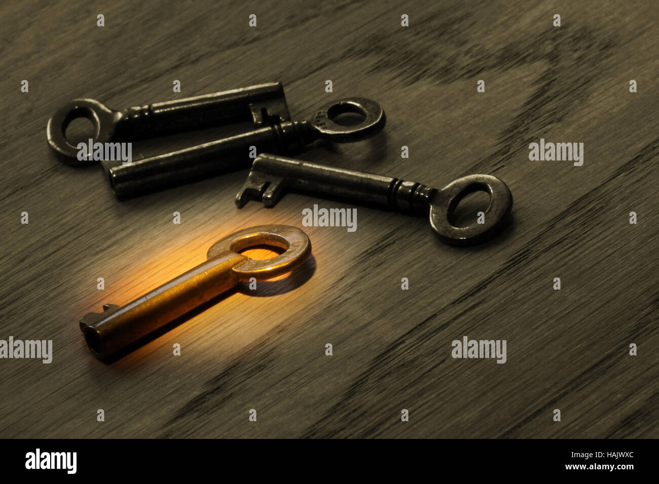 Old rusty keys highlighted to create, interest and mystery Stock Photo ...