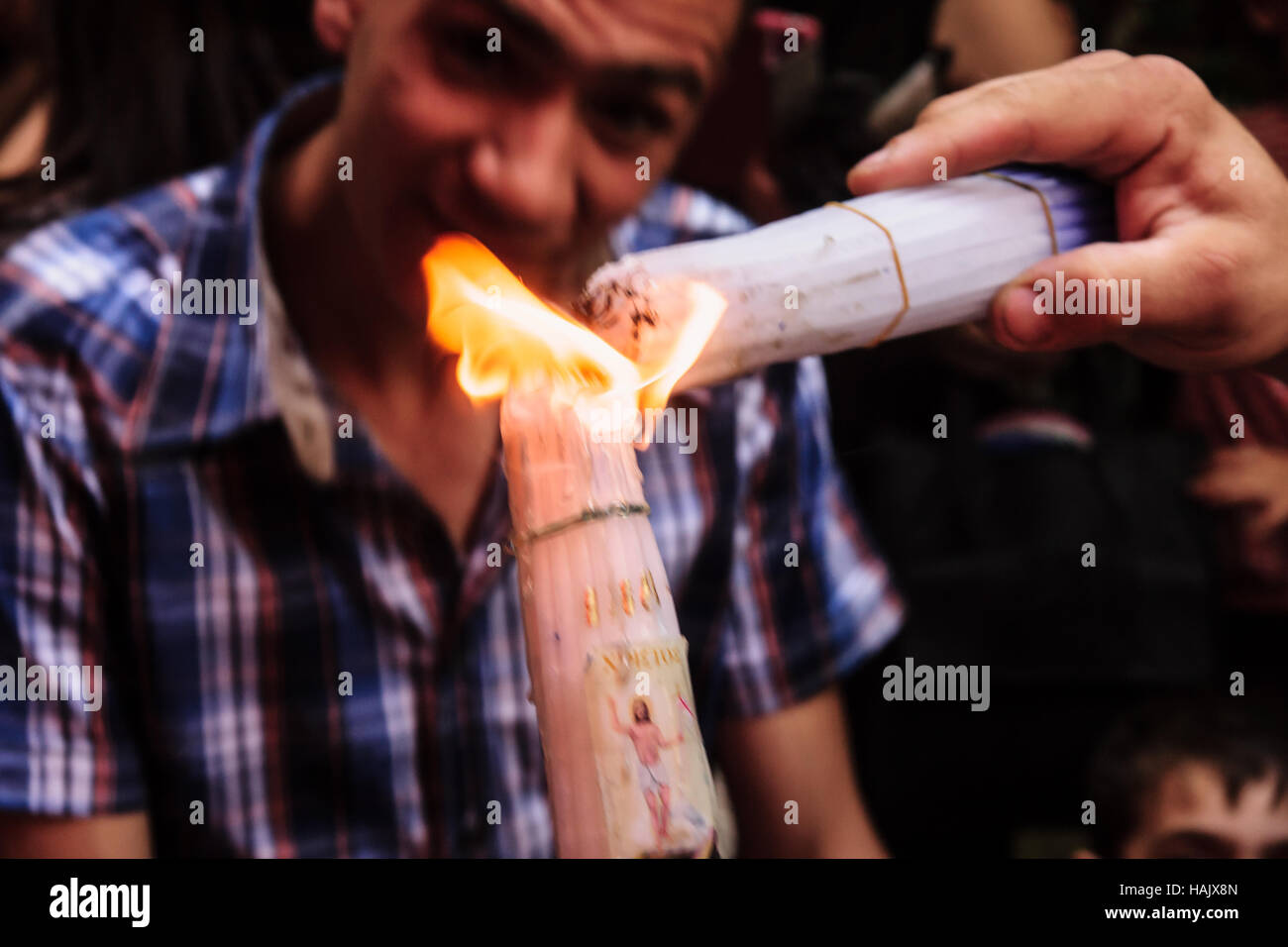 JERUSALEM - APRIL 19, 2014: The holy fire from the holy fire ceremony ...