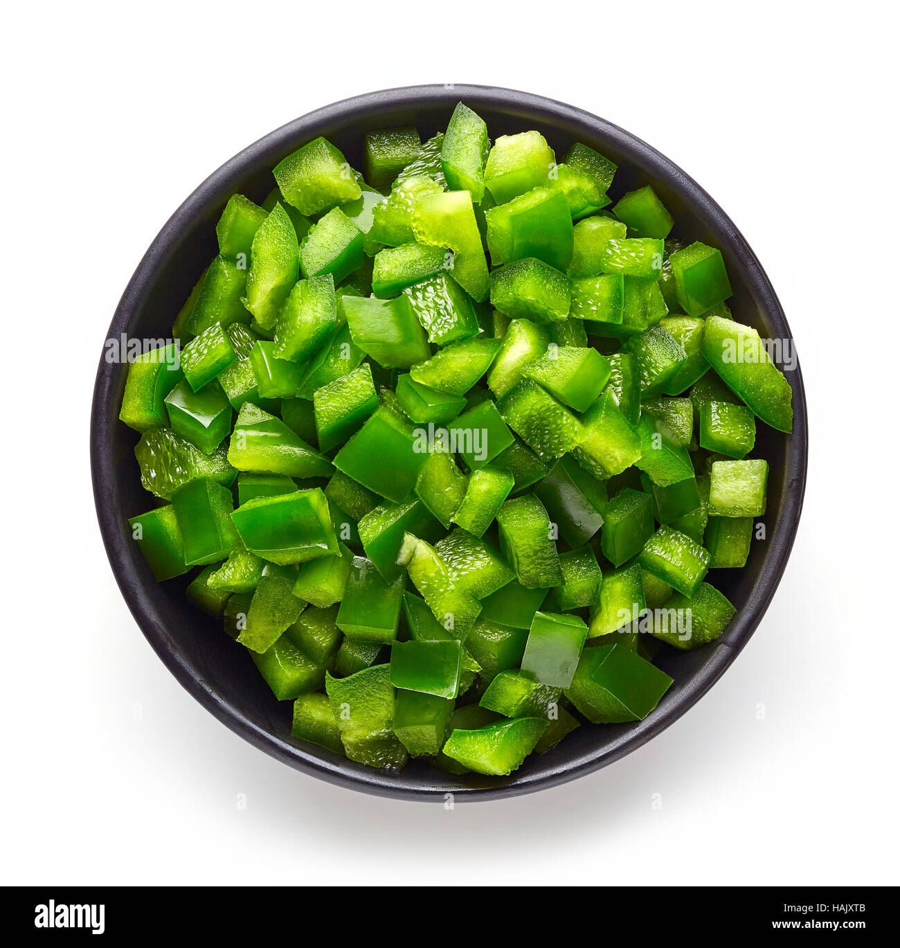 Bowl of chopped bell pepper isolated on white background, top view ...