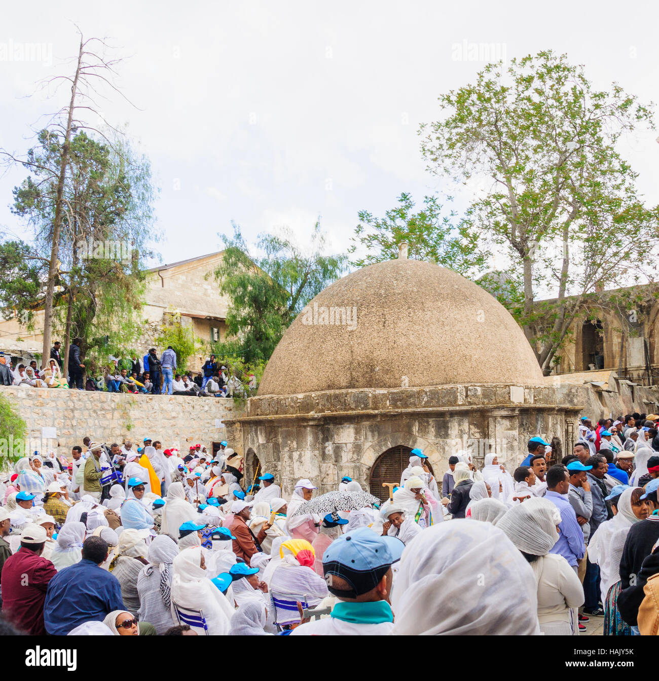 JERUSALEM, ISRAEL - APR 10, 2015: A crowd of Ethiopian pilgrims pray in ...