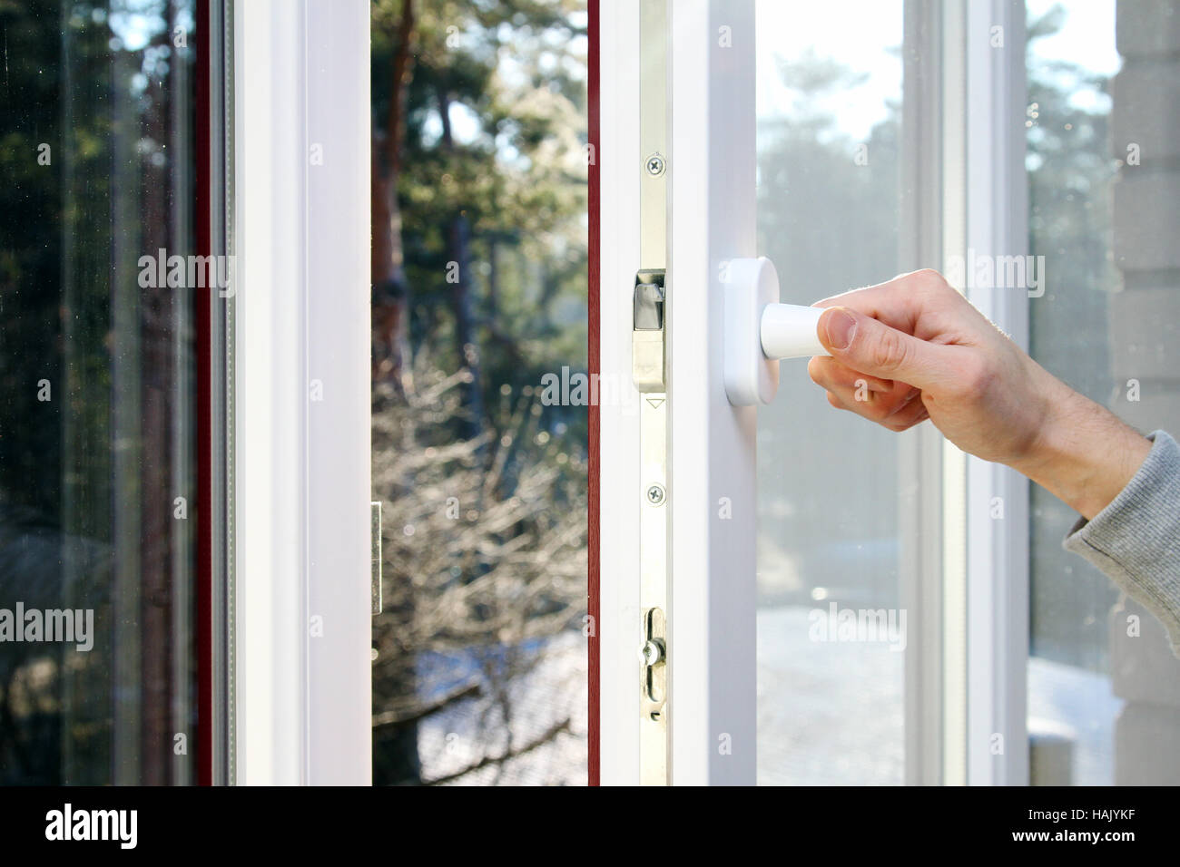 hand open plastic pvc window Stock Photo - Alamy
