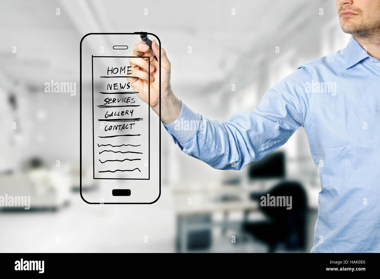 designer drawing mobile website development wireframe Stock Photo - Alamy