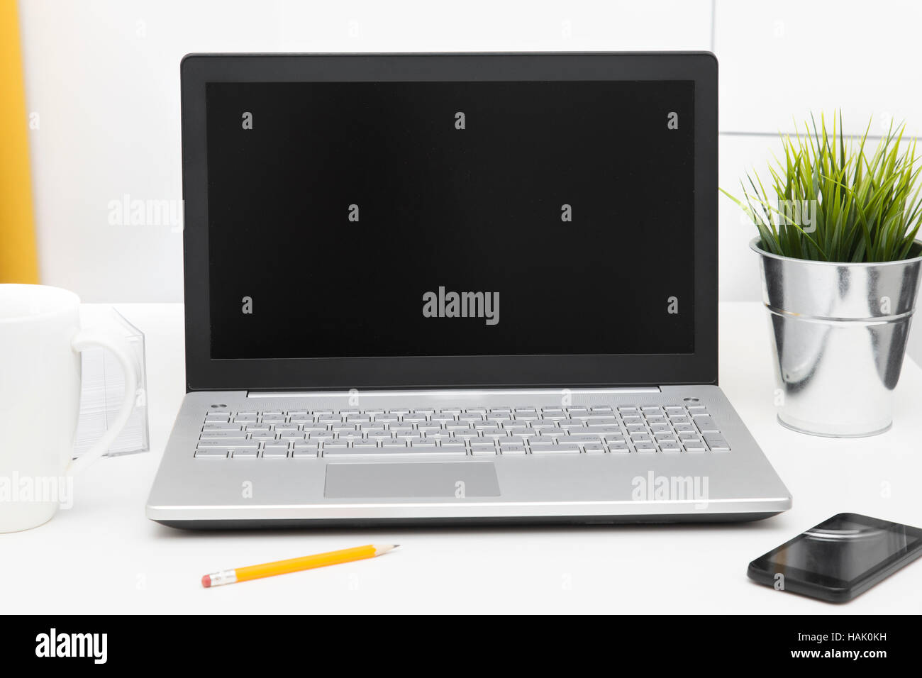 Blank laptop screen on table hi-res stock photography and images - Alamy