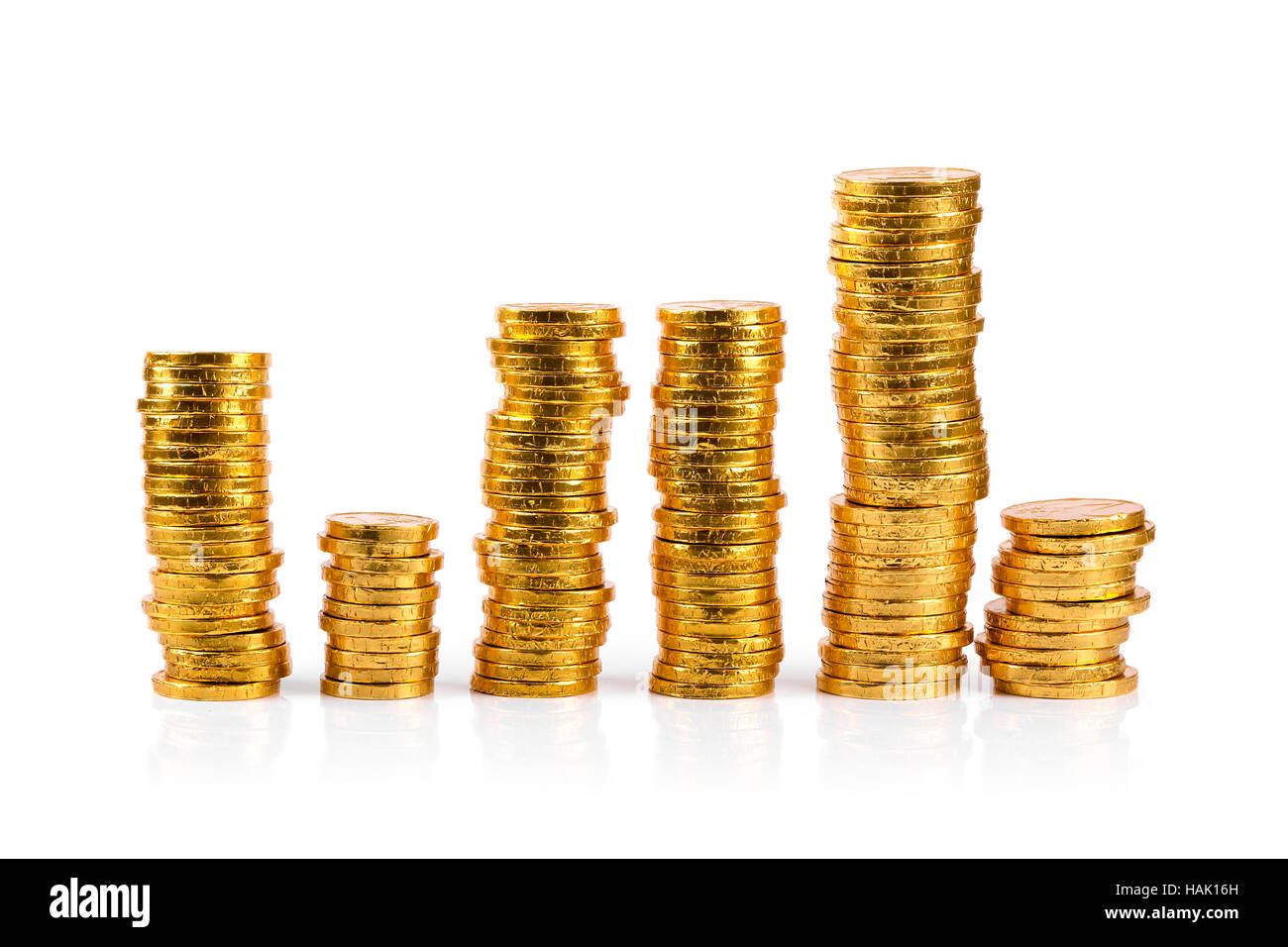 stacks of chocolate gold coins isolated on white background Stock Photo ...