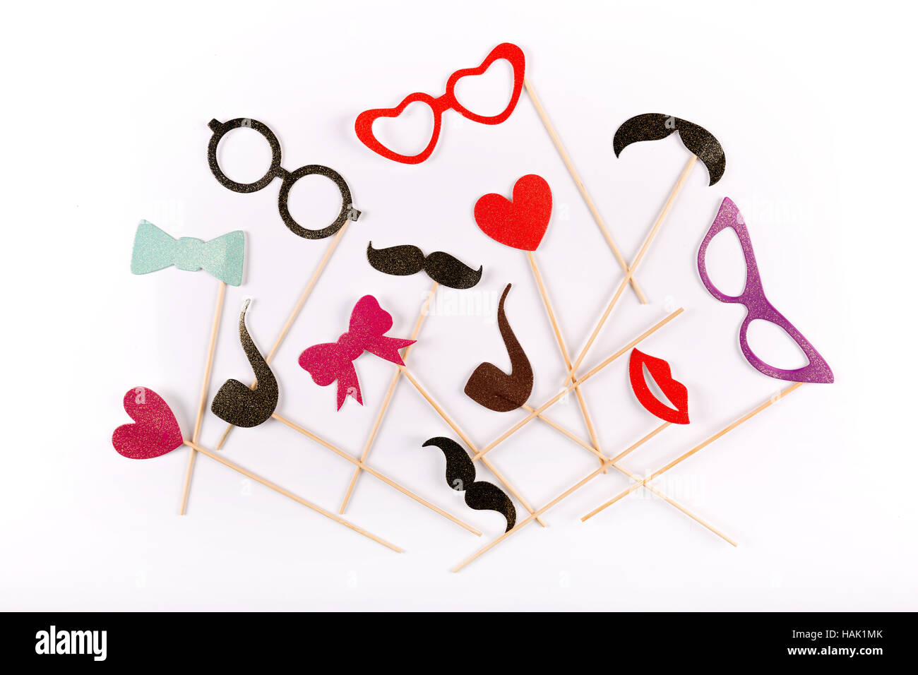 carnival party accessories on white background Stock Photo - Alamy