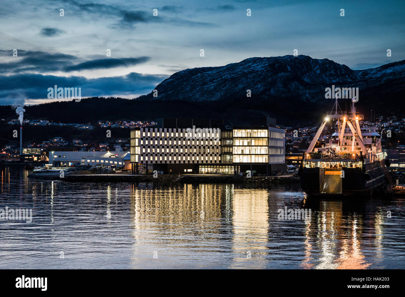 Fishing trawler in dock at Harstad in the early morning, Northern ...