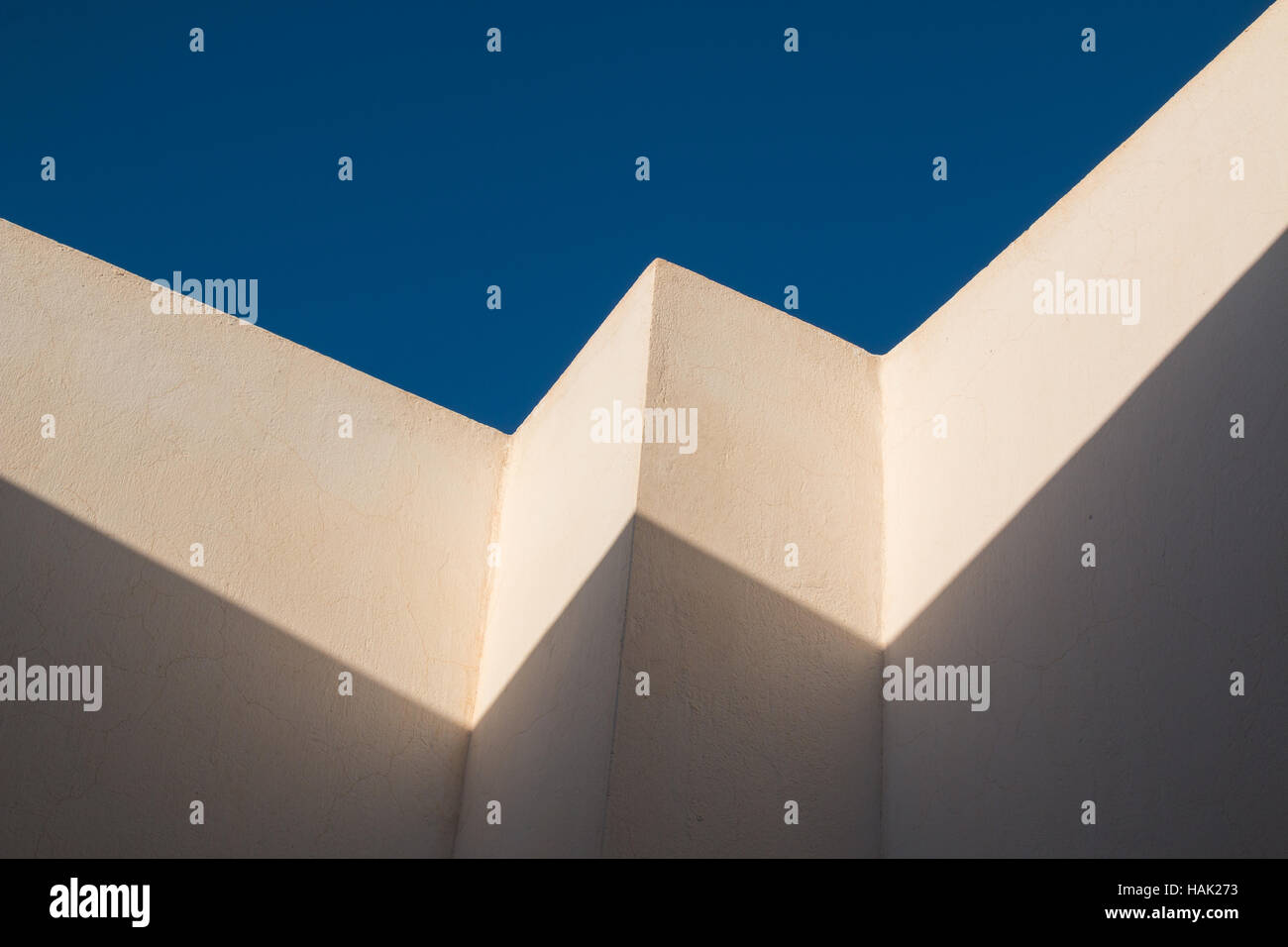 Detail of an architecture, enlightened on the edge by the sunlight ...