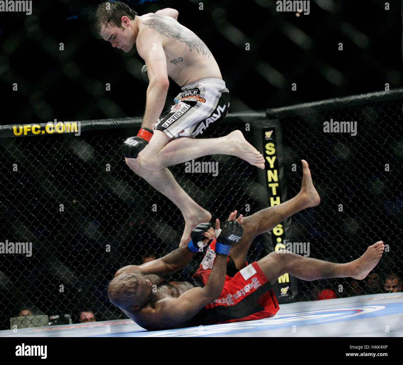 John Howard, bottom, fights Tamdan McCrory during UFC 101 at the ...