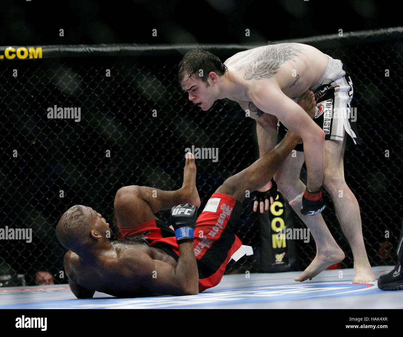 John Howard, bottom, fights Tamdan McCrory during UFC 101 at the ...
