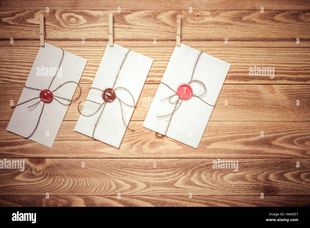 Mail envelope on rope Stock Photo - Alamy