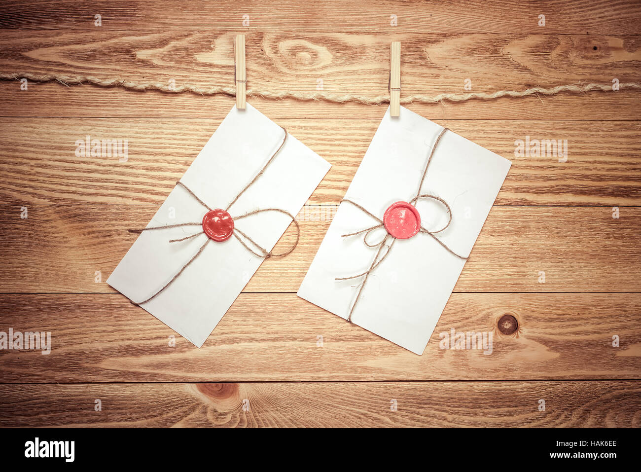 Mail envelope on rope Stock Photo - Alamy