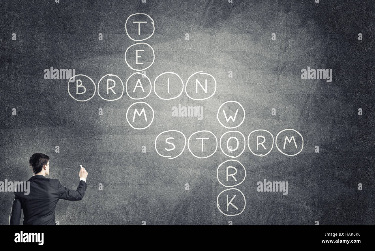 Seminar trainer draw on chalkboard Stock Photo - Alamy