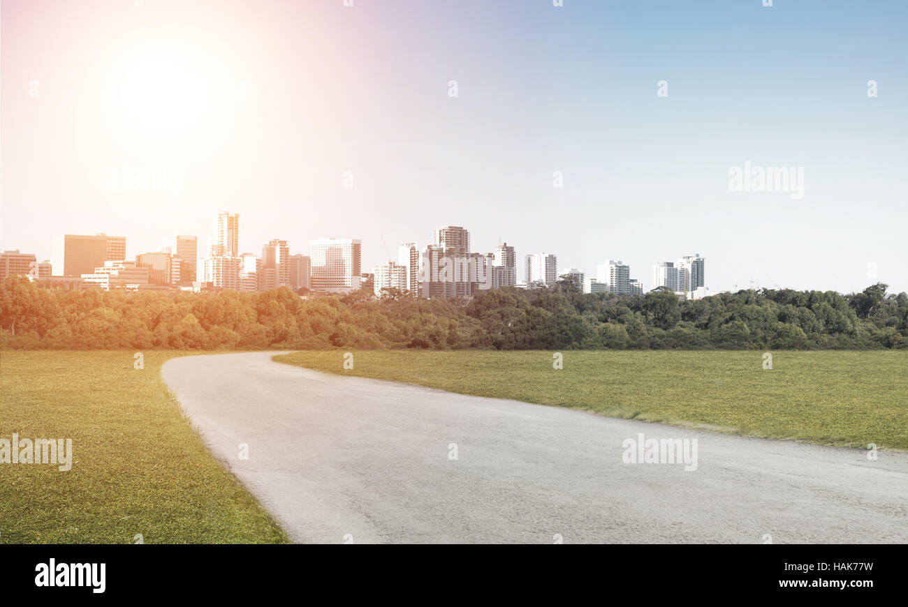 Road to big city Stock Photo - Alamy