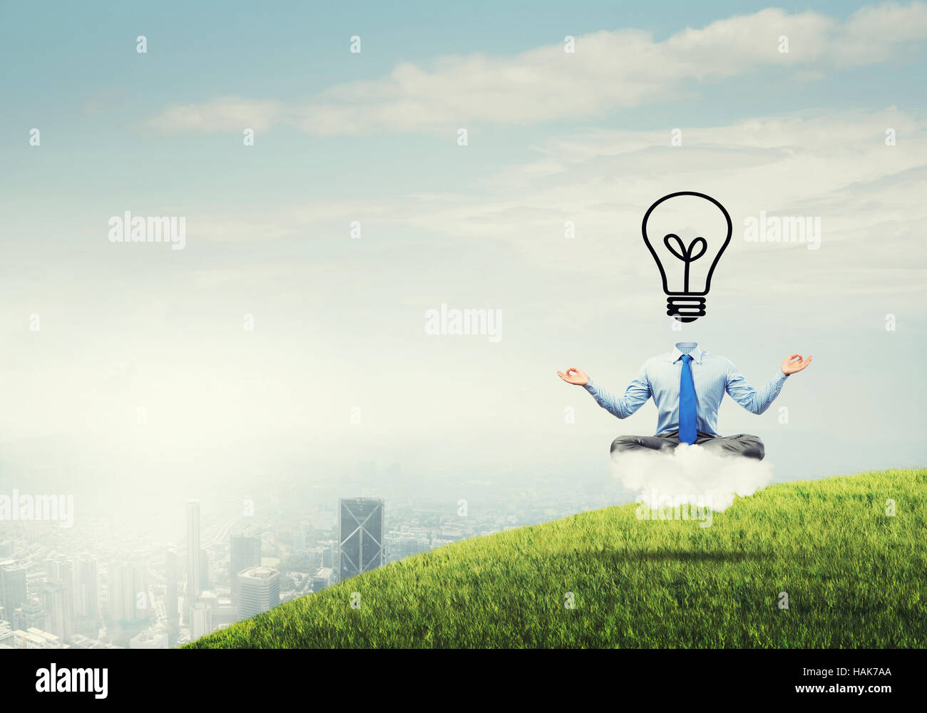 Headless businessman meditating Stock Photo - Alamy