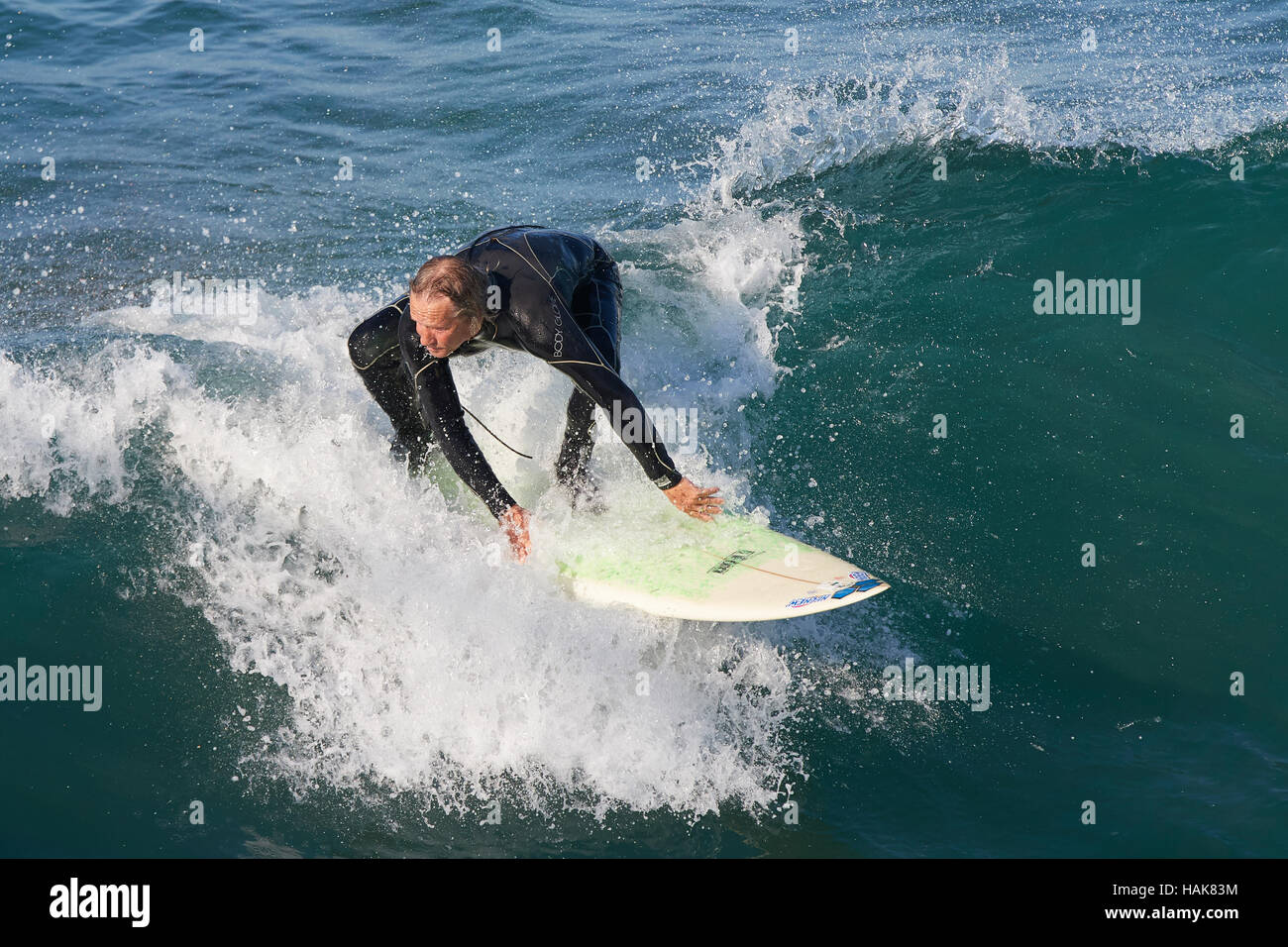 Side profile of a man surfing hi-res stock photography and images - Alamy