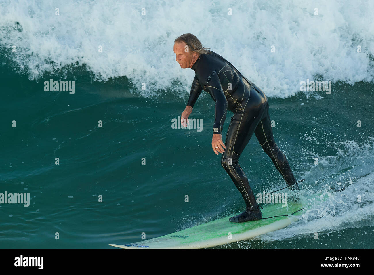 Side profile of a man surfing hi-res stock photography and images - Alamy