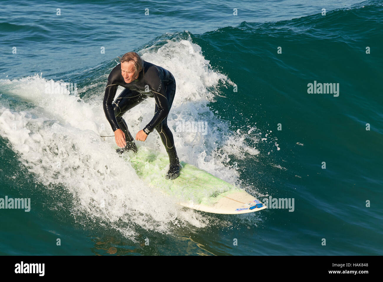 Side profile of a man surfing hi-res stock photography and images - Alamy