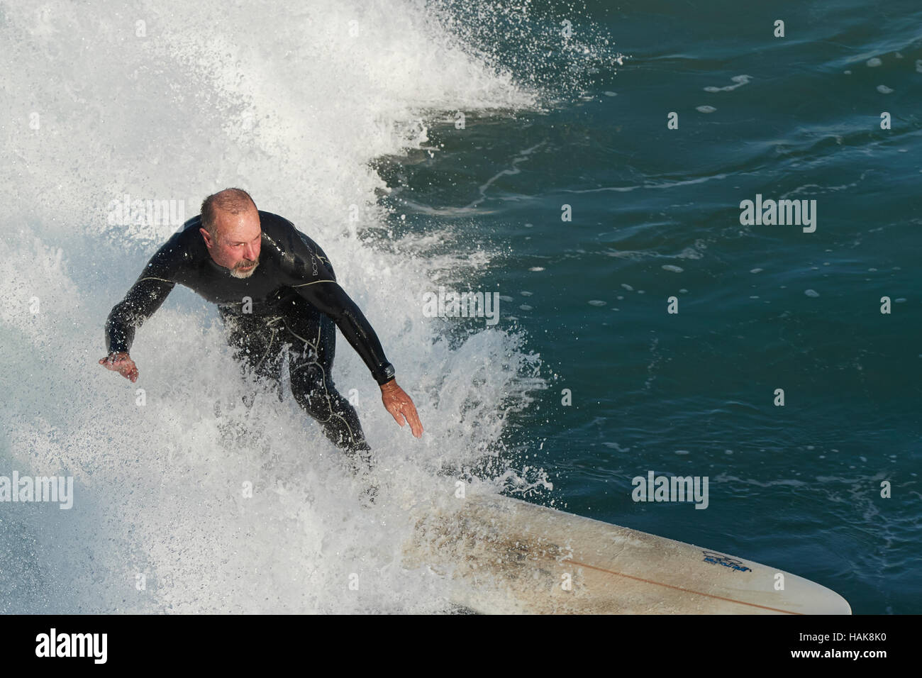 Side profile of a man surfing hi-res stock photography and images - Alamy