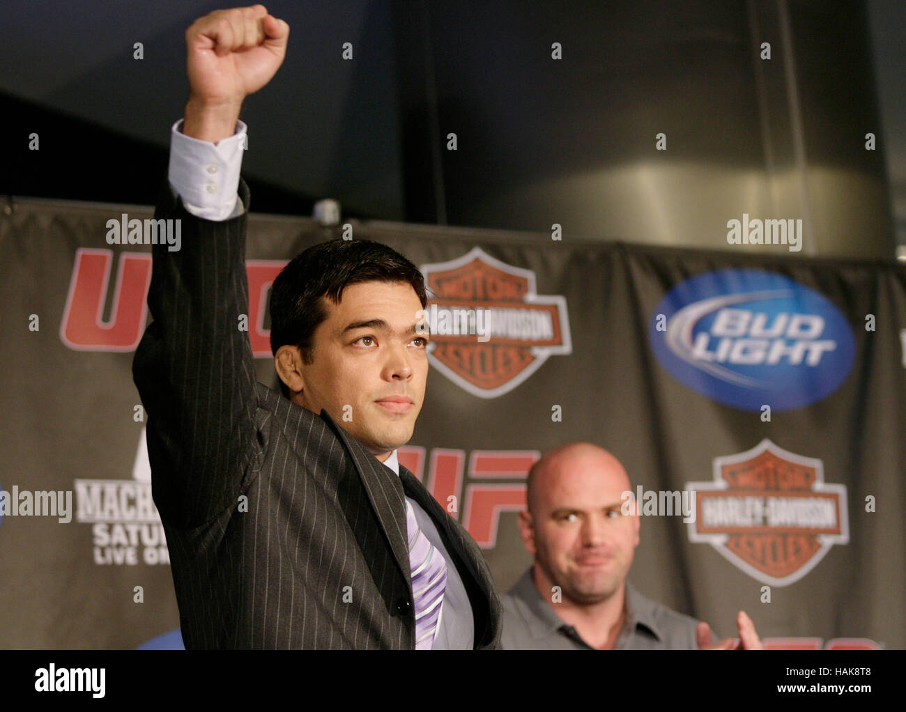 UFC fighter Lyoto Machida pumps his fist at a press conference in Los ...