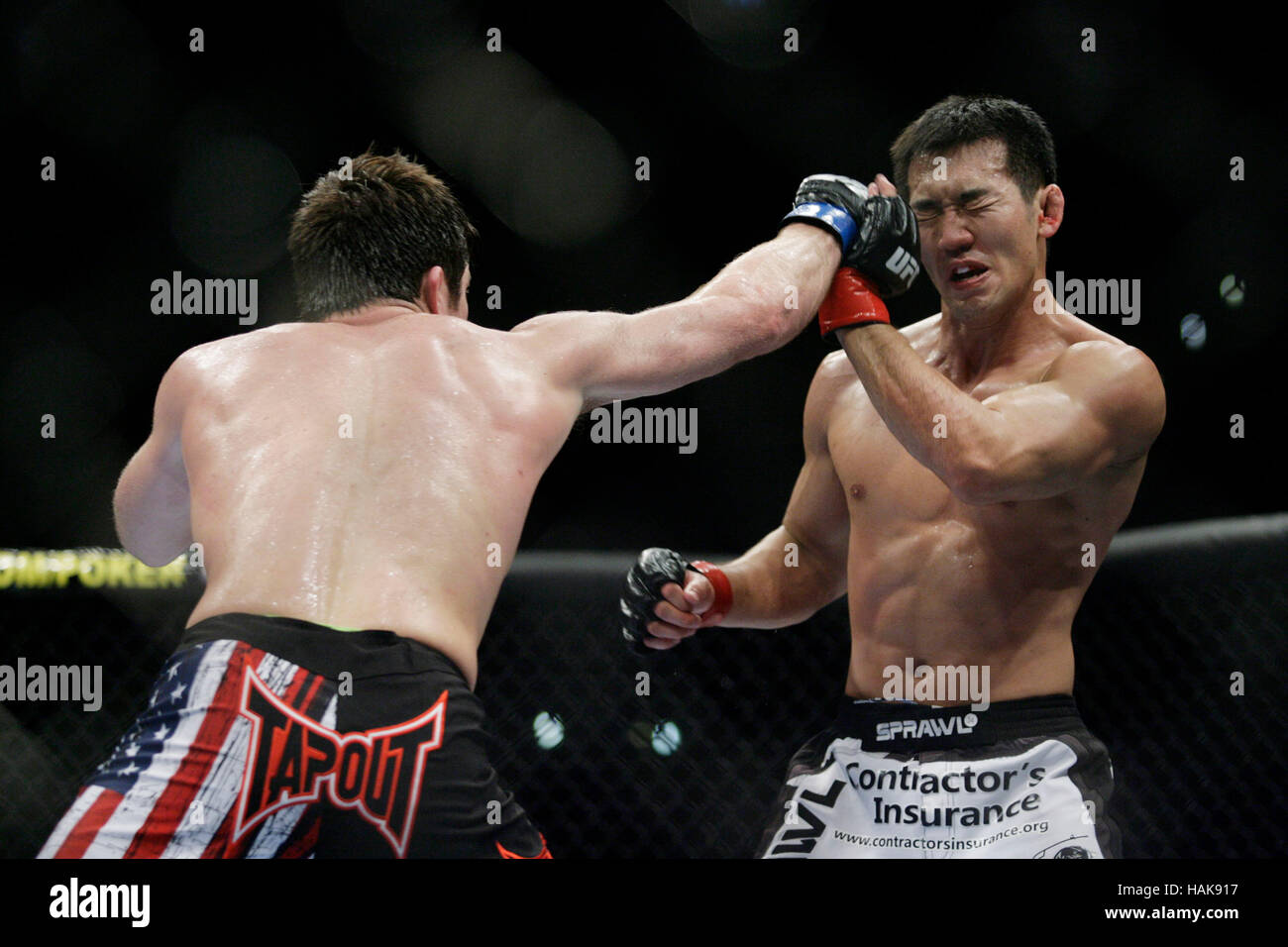 Chael Sonnen, left, fights Yushin Okami at UFC 104 at the Staples ...