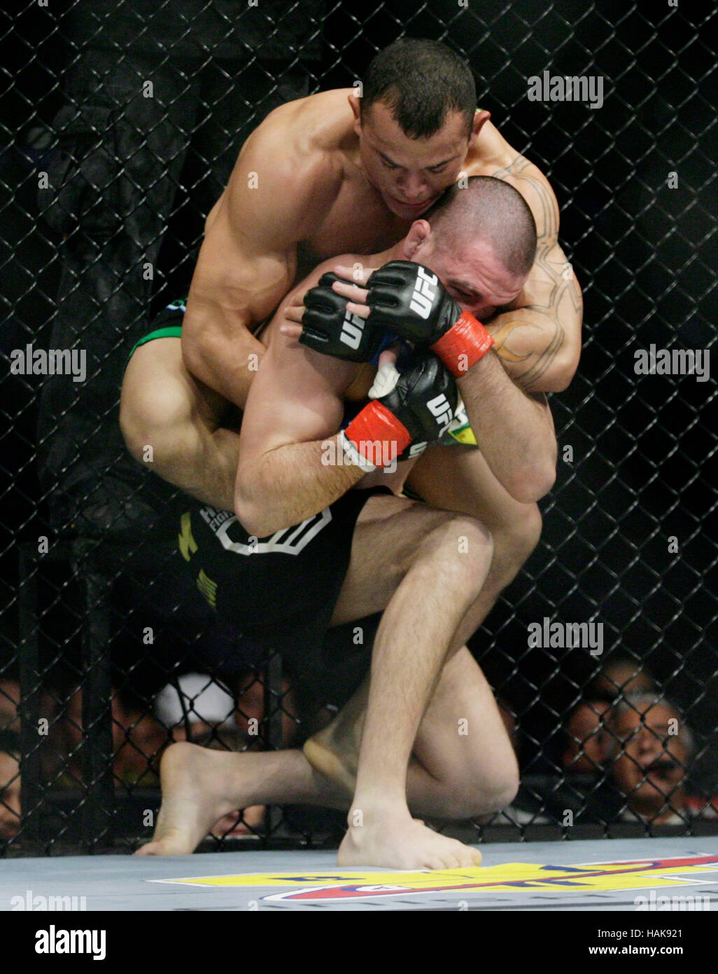 Josh Neer, bottom, fights Gleison Tibau at UFC 104 at the Staples ...